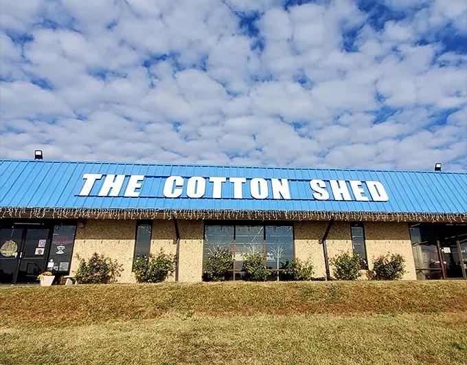 The blue-roofed wonderland beckons from I-30 like a siren call to treasure hunters. This isn't just shopping—it's an expedition into Arkansas's collective attic.