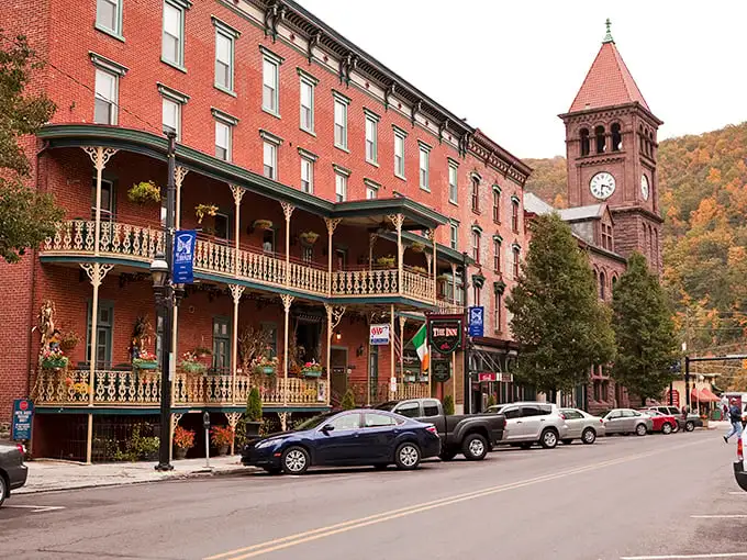 Broadway's red-brick splendor isn't just architectural eye candy—it's a time portal where Victorian charm meets small-town hospitality in perfect harmony.