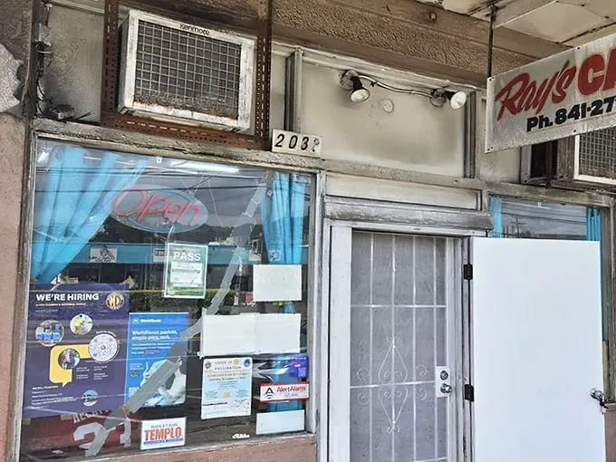 Welcome to Ray's Cafe, where the neon "OPEN" sign isn't just an invitation—it's a promise of culinary adventure!
