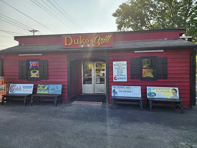 A red beacon of breakfast bliss! Duke's Grill stands proud, promising comfort food that'll make your taste buds do a happy dance.