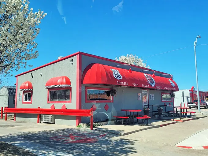Route 66 meets comfort food heaven! Sid's Diner's red-trimmed exterior promises a journey back to the golden age of American diners.