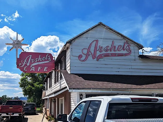 A star is born! Arshel's Cafe's iconic sign beckons road-trippers like a neon lighthouse, promising comfort food and slice-of-life experiences in equal measure.