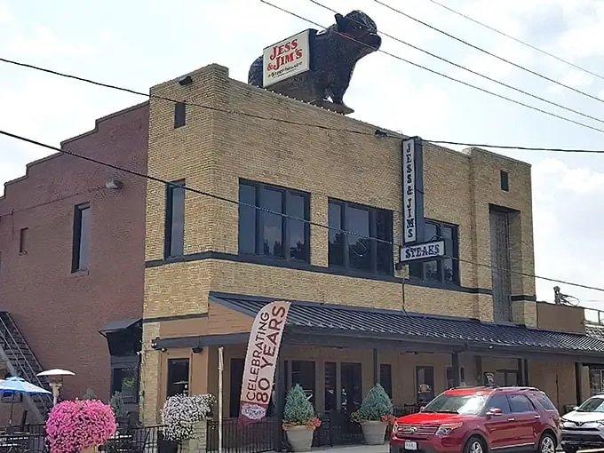 The unassuming brick exterior of Jess & Jim's Steakhouse stands as Kansas City's culinary secret hiding in plain sight, complete with vintage signage that's weathered decades.