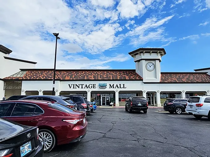 Welcome to the time machine! Decades Revisited's exterior promises a journey through the ages, with its Spanish-style roof and clock tower standing sentinel over vintage treasures.