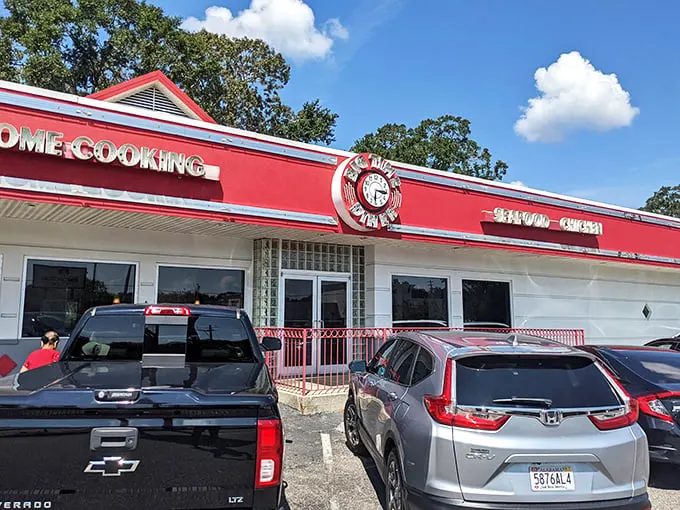 Step back in time! Big Time Diner's exterior is a cherry-red beacon of nostalgia, complete with a clock that seems to tick to the rhythm of rock 'n' roll.