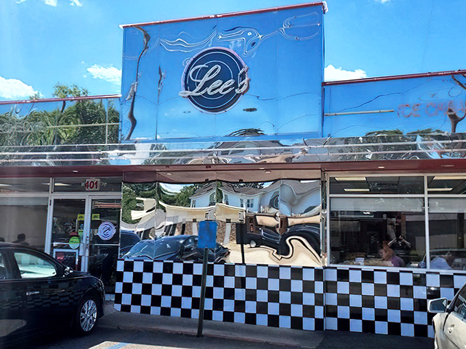 Step into a time warp! Lee's Diner's gleaming exterior promises a journey back to the fabulous fifties, complete with chrome and checkered charm.