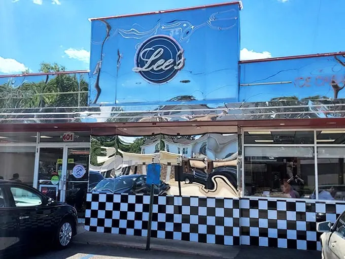 Step into a time warp! Lee's Diner's gleaming exterior promises a journey back to the fabulous fifties, complete with chrome and checkered charm.