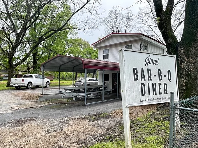 Welcome to barbecue heaven! Jones Bar-B-Q Diner's unassuming exterior hides a world of smoky delights. It's like finding a treasure chest disguised as a garden shed.