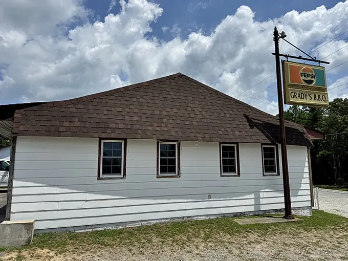 A humble white building with a Pepsi sign? This unassuming exterior hides a barbecue paradise that'll make your taste buds do a happy dance.
