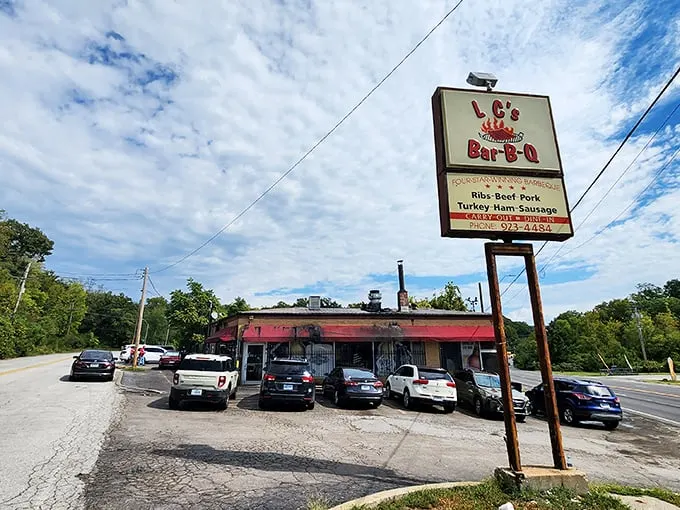 Like a barbecue lighthouse beckoning hungry souls, LC's modest exterior with its red awning and yellow poles promises smoky delights within.