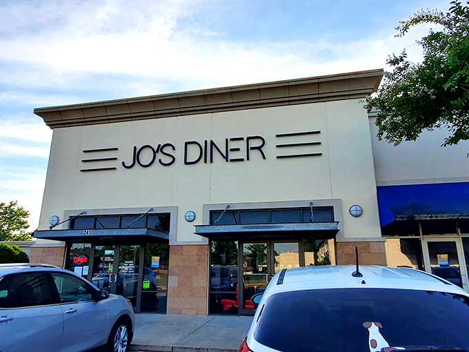 The classic facade of Jo's Diner in Flowood welcomes hungry patrons with its clean lines and retro signage—a beacon of breakfast bliss in Mississippi.