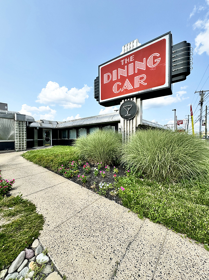 The gleaming Art Deco exterior of The Dining Car stands as a shining beacon of classic Americana, promising comfort food and nostalgia in equal measure.
