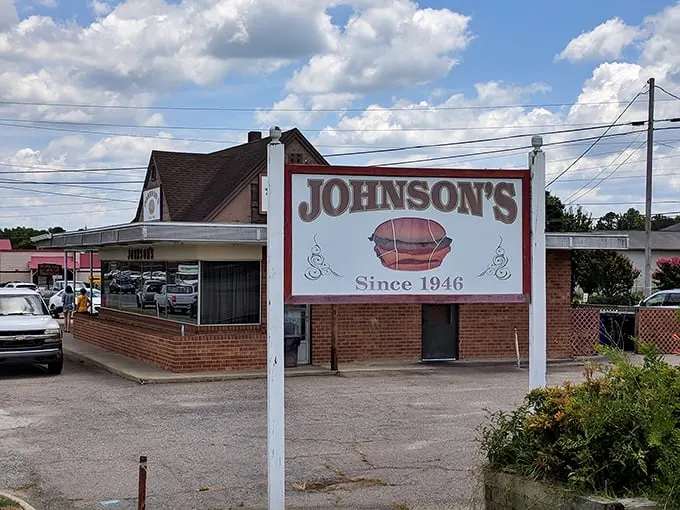 Time-travel never tasted so good! Johnson's Drive-In, serving up nostalgia and mouthwatering burgers since 1946. This retro sign is your portal to flavor paradise.