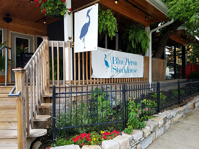 A blue beauty that's more inviting than a warm blanket on a chilly Kentucky evening. This charming steakhouse beckons with the promise of culinary delights and cozy ambiance.