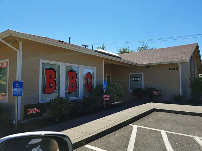 The unassuming exterior of Roger That BBQ stands as Salem's smoke signal to barbecue pilgrims—those bold red BBQ letters promising salvation for the hungry soul.