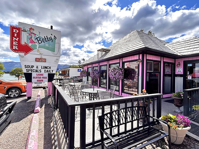 Step back in time! Betty's Diner's retro exterior, complete with a sassy cartoon waitress, promises a trip down memory lane and some seriously good eats.