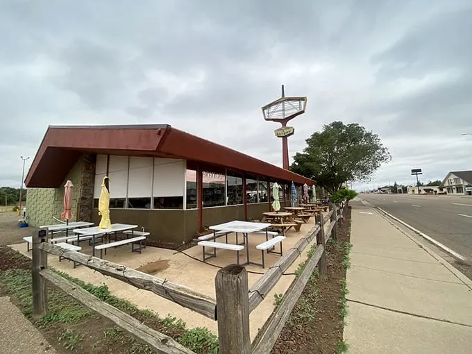 The mid-century architecture of Kix on 66 stands proudly against the New Mexico sky, a time capsule serving comfort on a plate.