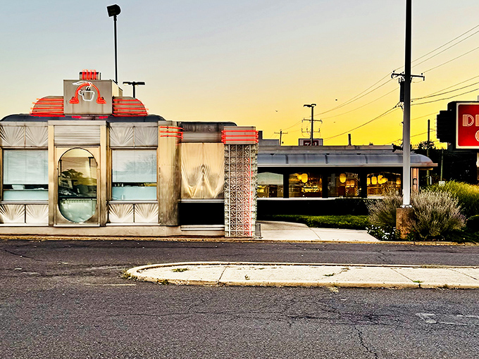 The gleaming Art Deco exterior of The Dining Car stands as a shining beacon of classic Americana, promising comfort food and nostalgia in equal measure.