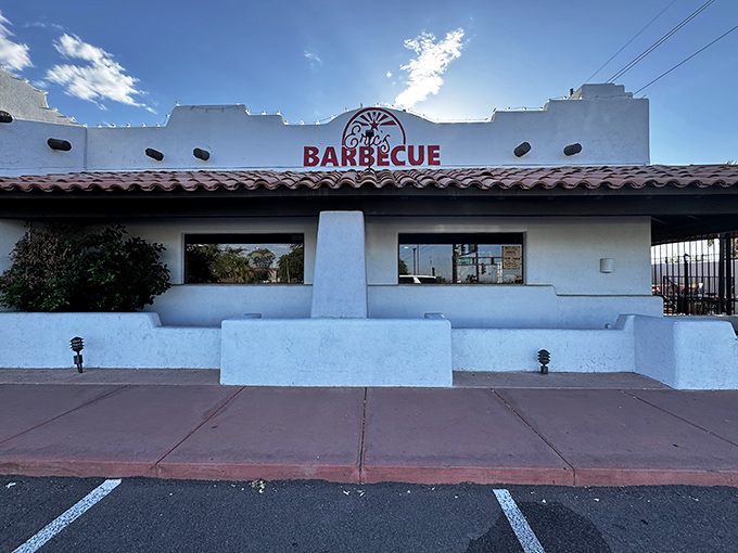 The white facade with that iconic red logo beckons like a barbecue lighthouse, guiding hungry souls to smoky salvation in Avondale.