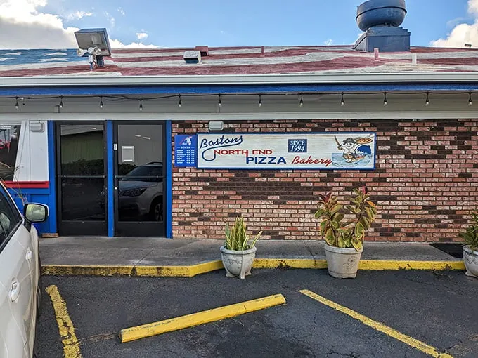 Welcome to pizza paradise! Boston's North End Pizza Bakery stands proud, its blue-trimmed exterior promising a slice of heaven in the heart of Aiea.