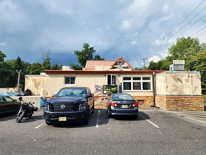 The unassuming exterior of Golden Nugget Tavern stands like a culinary speakeasy—no fancy frills, just the promise of legendary wings waiting inside.