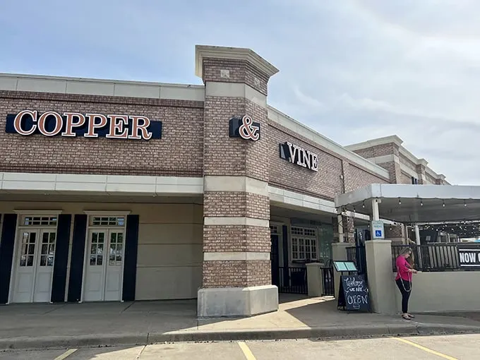 Welcome to Copper & Vine, where brick and mortar meet culinary magic. This unassuming exterior houses a world of flavor waiting to be discovered.