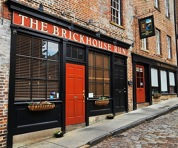 Historic charm meets culinary magic where those bright red doors practically shout, "Come in, the cobblestones have been waiting for you!"