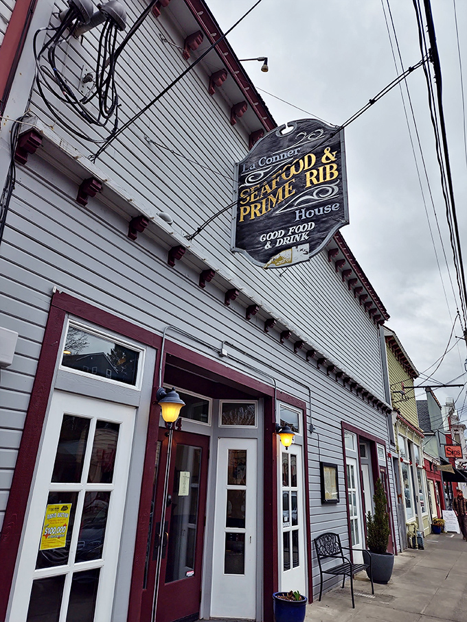 A beacon of culinary delight! This charming exterior promises a feast for the senses, with its inviting glow and classic small-town charm. 
