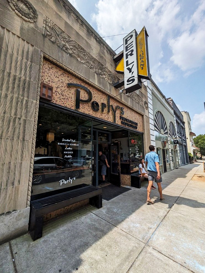 Perly's vintage storefront promises time travel via sandwich – the yellow sign beckons like a delicious lighthouse for the famished and fancy-free.