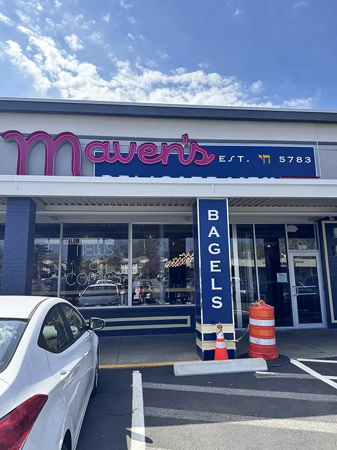 Welcome to sandwich paradise! Maven's exterior promises a feast for the senses, with its playful purple sign and inviting storefront. Deli dreams start here, folks!