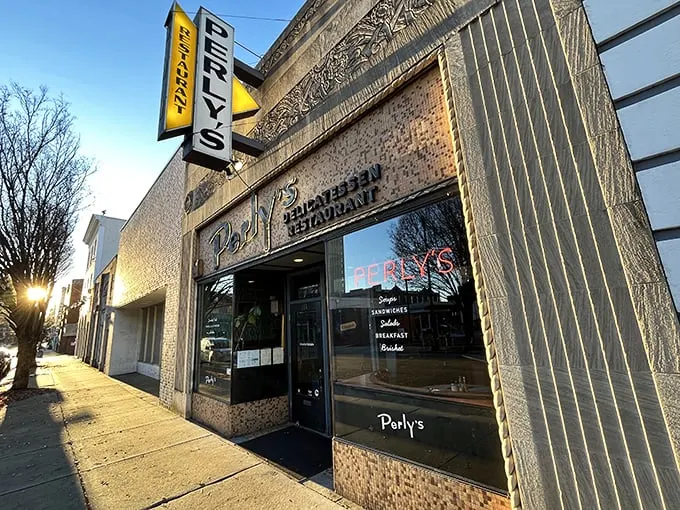 Perly's vintage storefront promises time travel via sandwich – the yellow sign beckons like a delicious lighthouse for the famished and fancy-free.