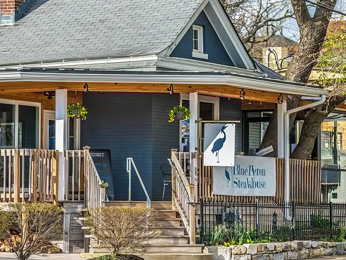 A blue beauty that's more inviting than a warm blanket on a chilly Kentucky evening. This charming steakhouse beckons with the promise of culinary delights and cozy ambiance.