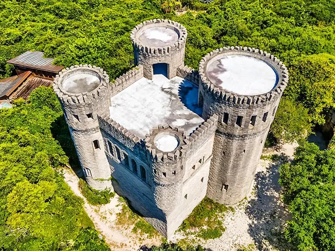 "Hogwarts, Florida campus?" Nope, it's Castle Otttis! This stone fortress rises from the lush greenery like a medieval mirage in the Sunshine State.