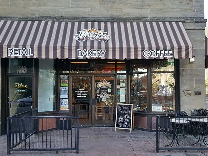 Step into a world where stripes aren't just for zebras! Goldy's Corner beckons with its charming awning, promising delights that'll make your taste buds do a happy dance.