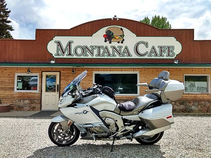 Welcome to the Montana Café, where the buffalo roam... right onto your plate! This charming exterior promises a feast of epic proportions inside.