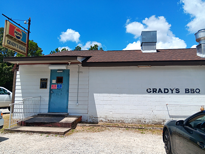 A humble white building with a Pepsi sign? This unassuming exterior hides a barbecue paradise that'll make your taste buds do a happy dance. 