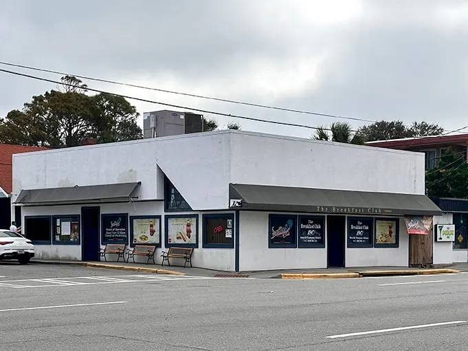 A humble facade hides a breakfast bonanza. This unassuming building is like a treasure chest filled with golden omelets and syrupy delights.
