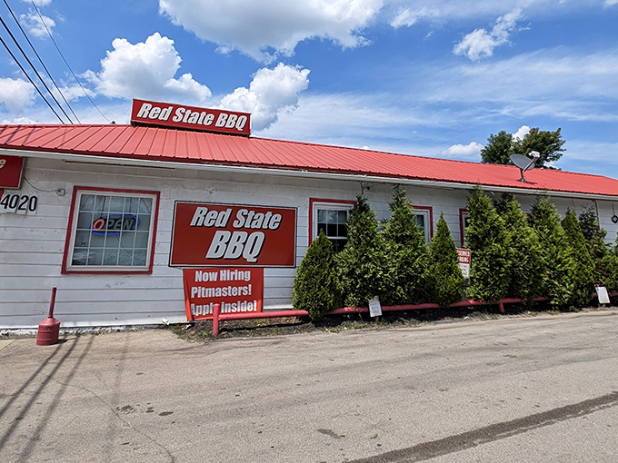 Welcome to BBQ paradise! Red State BBQ's unassuming exterior hides a world of smoky delights, proving you can't judge a book by its cover – or a restaurant by its siding.