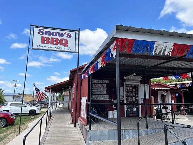Welcome to barbecue paradise! Snow's BBQ stands proud, its red-white-and-blue bunting fluttering like a carnivore's call to arms.