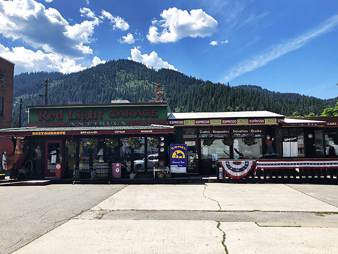 Welcome to the Red Light Garage, where nostalgia meets appetite! This quirky facade promises a journey through time and taste, all nestled in the heart of Wallace, Idaho. 