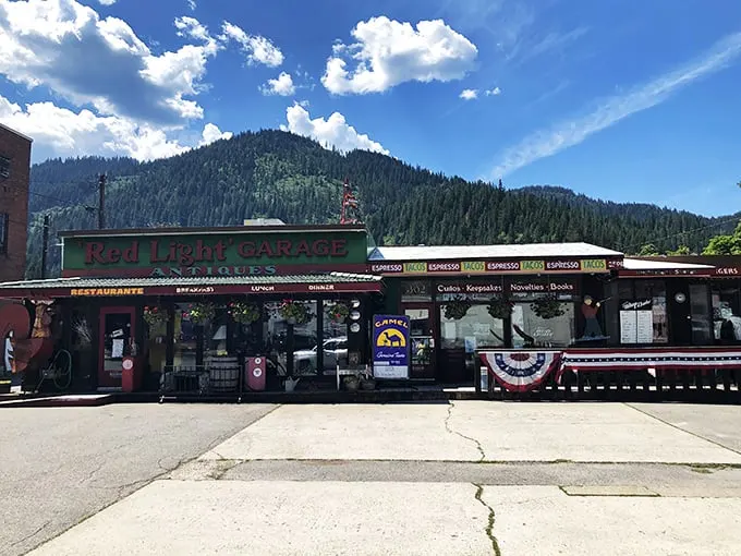 Welcome to the Red Light Garage, where nostalgia meets appetite! This quirky facade promises a journey through time and taste, all nestled in the heart of Wallace, Idaho.