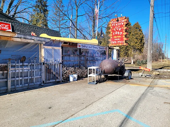Welcome to Foxfire Fixin's, where rustic charm meets culinary adventure! This exterior screams "come on in" louder than your grandma at Thanksgiving dinner.