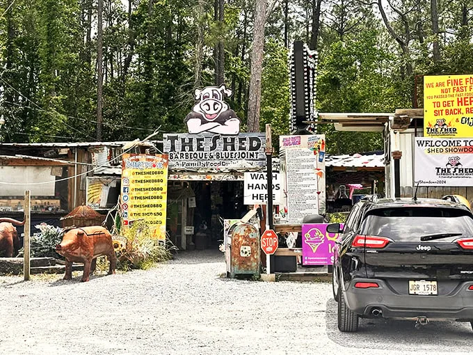 Welcome to barbecue paradise! The Shed's exterior is a delightful hodgepodge of rustic charm and quirky personality, like your eccentric uncle's dream treehouse come to life.