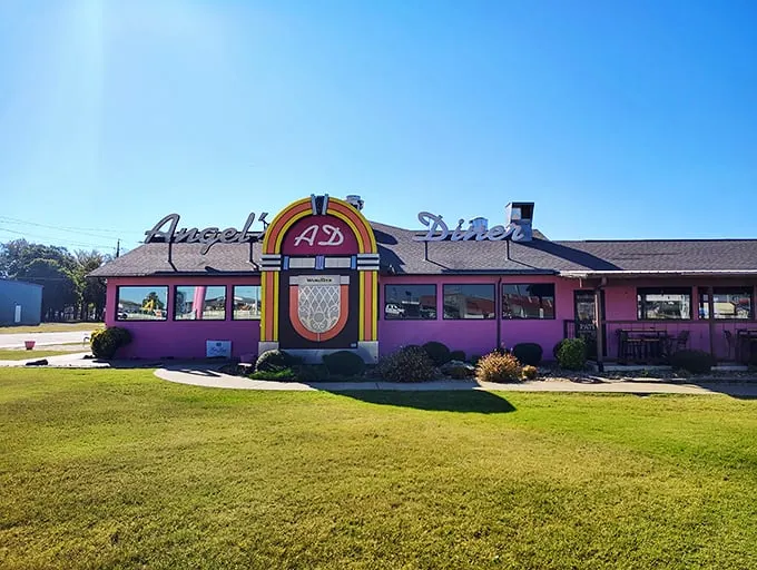 Pink paradise or retro time machine? Angel's Diner's exterior is a vibrant beacon of nostalgia that'll have you reaching for your poodle skirt and saddle shoes.