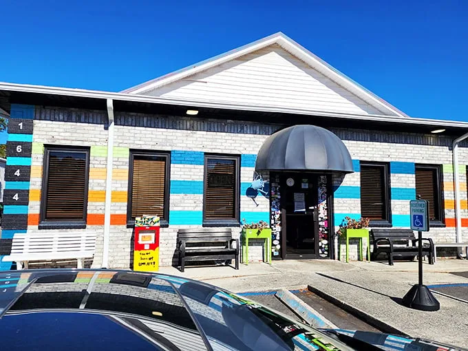 Welcome to waffle wonderland! This colorful exterior is like a Wes Anderson set come to life, promising delicious adventures within.