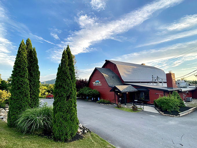 A barn-raising good time! The Publyk House stands tall, its red exterior a beacon for hungry travelers seeking a taste of Vermont charm.