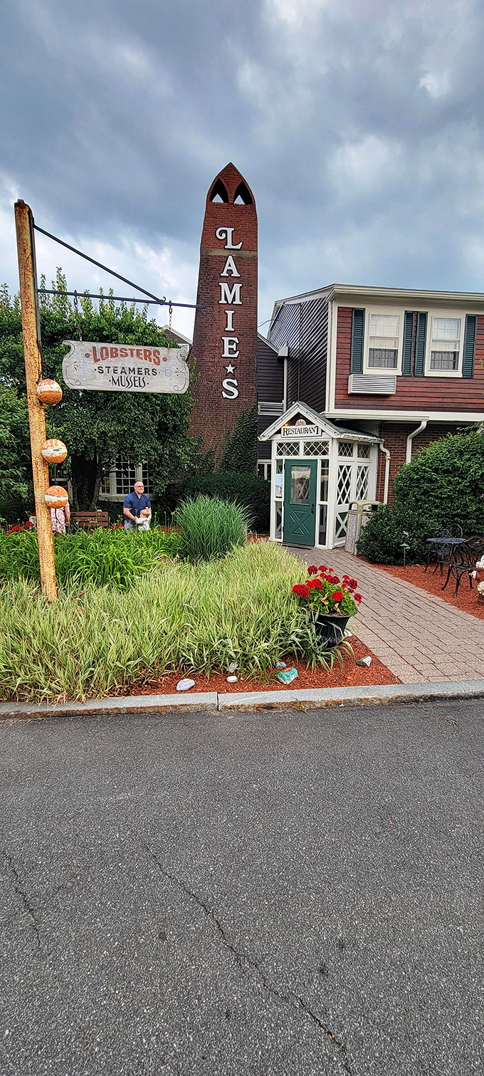 A beacon of culinary delight! The Old Salt's exterior promises a feast for the senses, with its charming New England facade and inviting red accents.