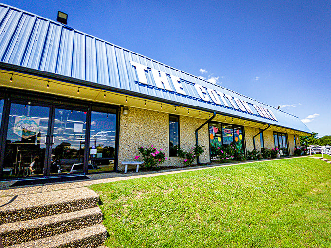 The blue-roofed wonderland beckons from I-30 like a siren call to treasure hunters. This isn't just shopping—it's an expedition into Arkansas's collective attic.
