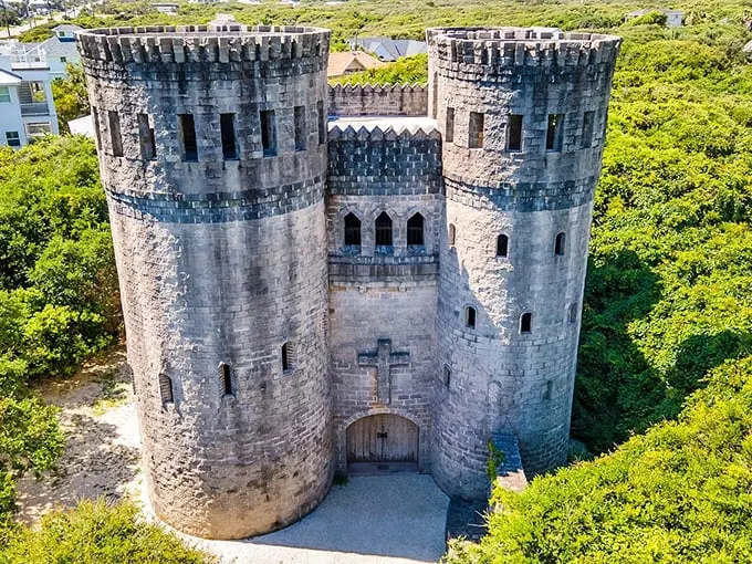 "Hogwarts, Florida campus?" Nope, it's Castle Otttis! This stone fortress rises from the lush greenery like a medieval mirage in the Sunshine State.