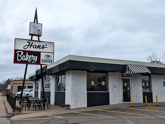 Welcome to carb heaven! Hans' Bakery's retro sign beckons like a siren call to donut lovers everywhere.